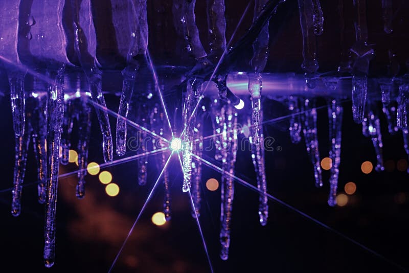 Icicle at Night and Christmas Lights Stock Photo - Image of lights ...