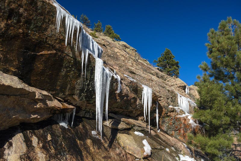 Icicle Stalactites Hanging from Rocks in the Mountains Stock Photo ...