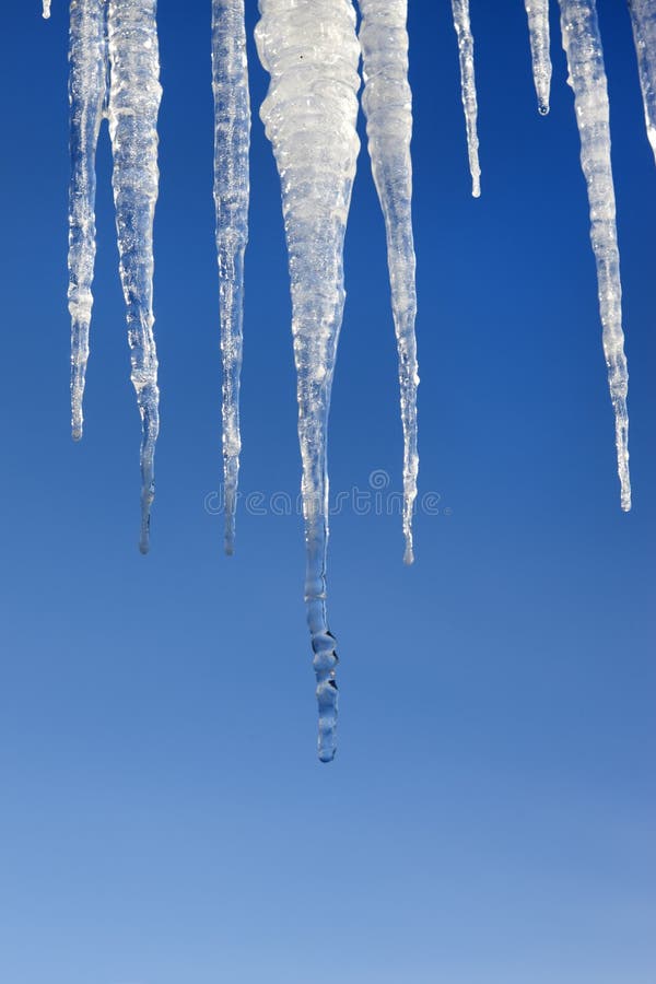 Icicles and blue sky. stock photo. Image of icicle, nature - 37549494