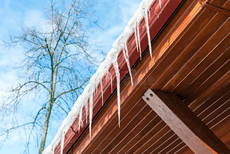 Icicles on the eaves stock image. Image of frozen, snow - 37646749
