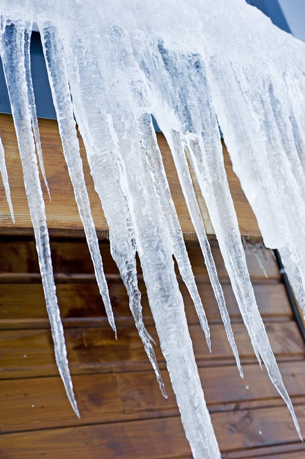 Icicles Hanging from a Building Stock Photo - Image of hang, growth ...