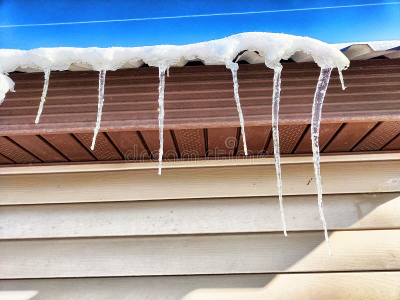 Icicles Hanging Dangerously from Roof Edge during Winter and Spring ...