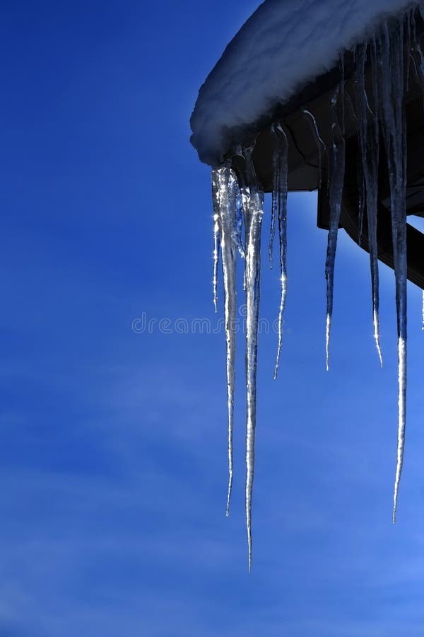 Icicles Hanging from Rooftop of Home Melted Ice Dripping Stock Photo ...