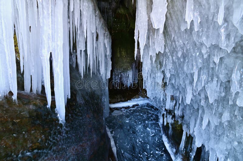 Ice Cave with Crystal Blue Icicles at Lake Baikal Stock Photo - Image ...