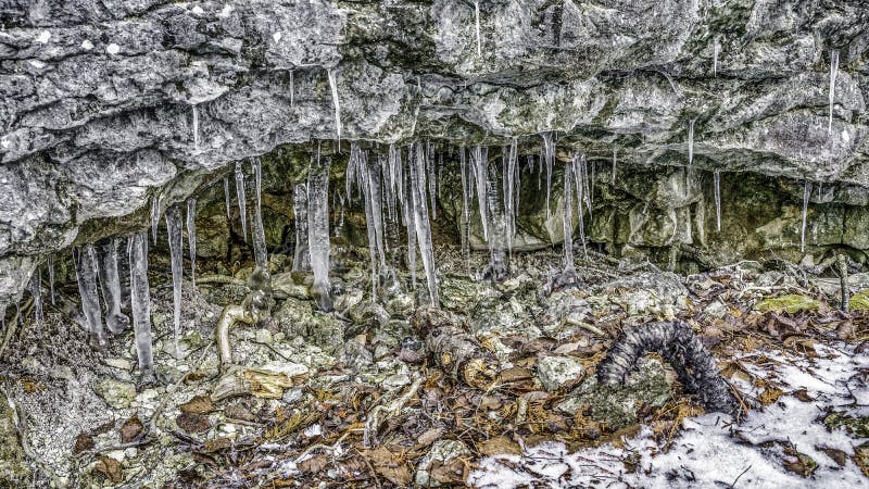 Icicles on a Rock Cliff Face in Late Fall Stock Image - Image of ...