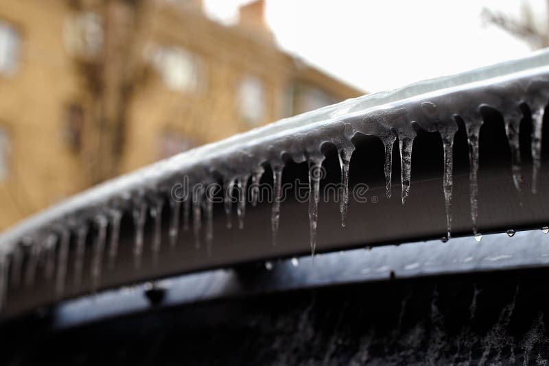 Icicles on the Machine. Icicles on the Trunk of a Car Stock Photo ...