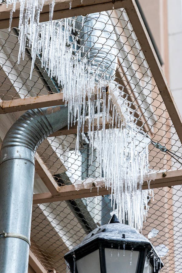 Icicles on the Office Building Stock Photo - Image of icicle, danger ...