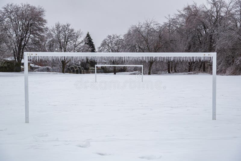 Icicles on soccer goal stock photo. Image of snow, icee - 206819422