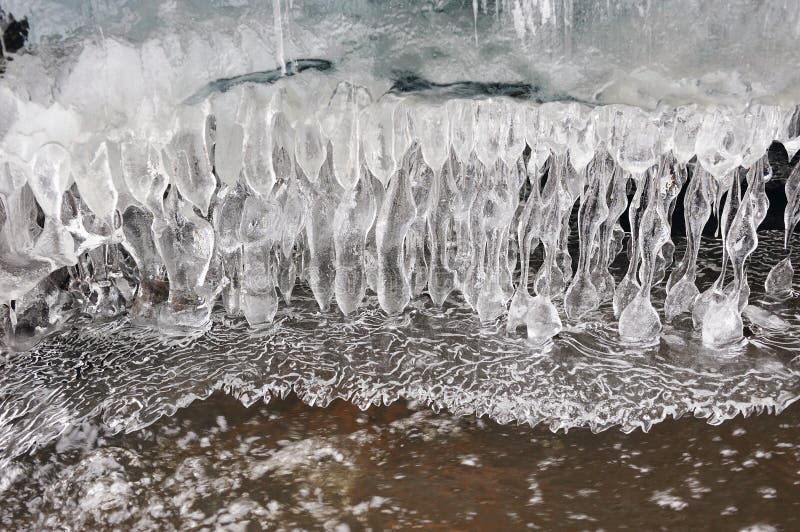 Icicles and water flow stock photo. Image of frost, nature - 68313256