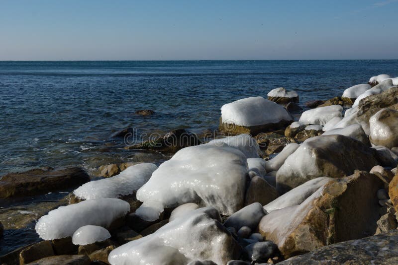 Icing up stones. stock photo. Image of rock, cold, stones - 86391432