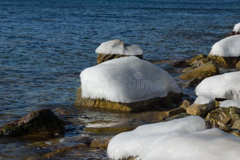 Icing up stones. stock photo. Image of winter, ashore - 86391916