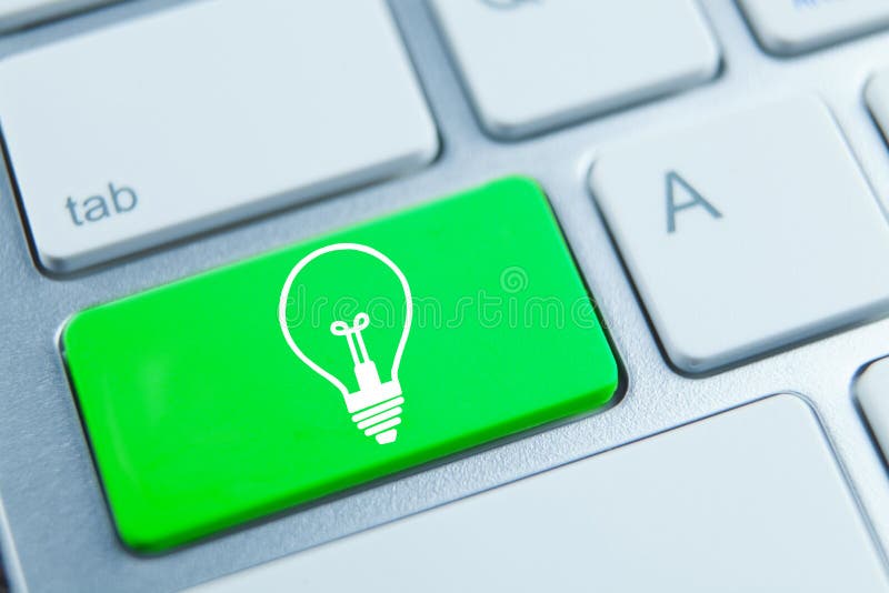 The Icon of the Light Bulb on the Keyboard Stock Photo - Image of ...