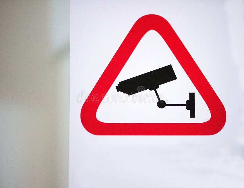 Icon of a Surveillance Camera in a Red Triangular Frame. Stock Photo ...