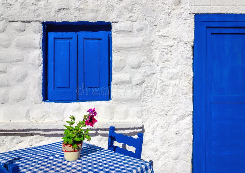 Iconic Blue Table with Wooden Chairs , Greece Stock Image - Image of ...