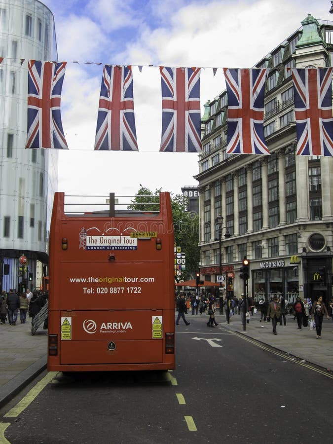 An Iconic Red Bus and Union Flags Editorial Photo - Image of jack ...