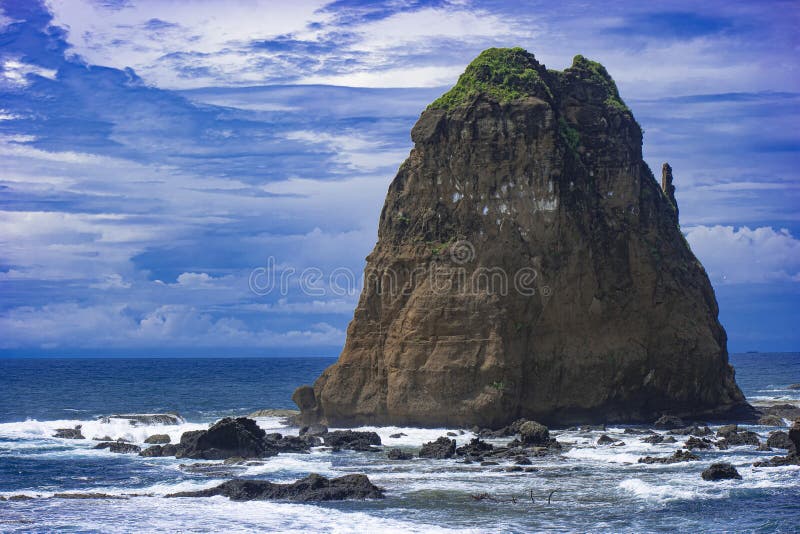 Iconic rock on the ocean stock image. Image of summer - 255323461