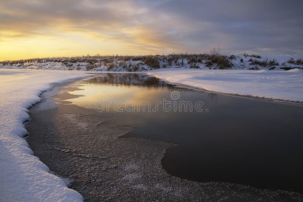 Icy banks of a small river stock photo. Image of banks - 176011248