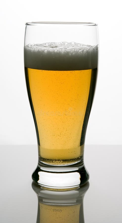 Icy Cold Frosty Draft Beer in Glass Stock Image - Image of spill ...