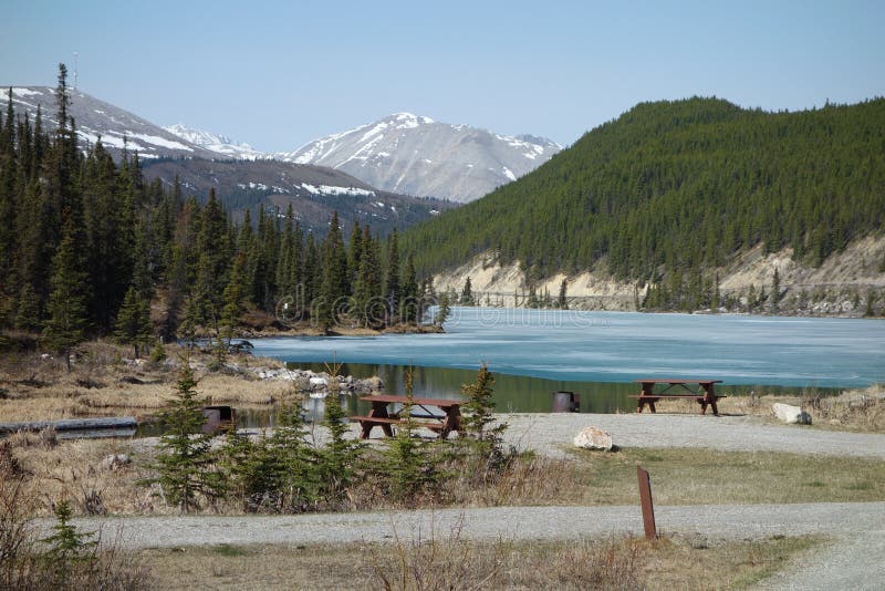 An Icy Lake at a Mountain Summit. Stock Image - Image of mountains ...
