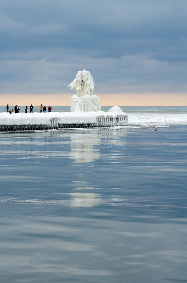 Icy Lighthouse and Tourists Editorial Photography - Image of landscape ...