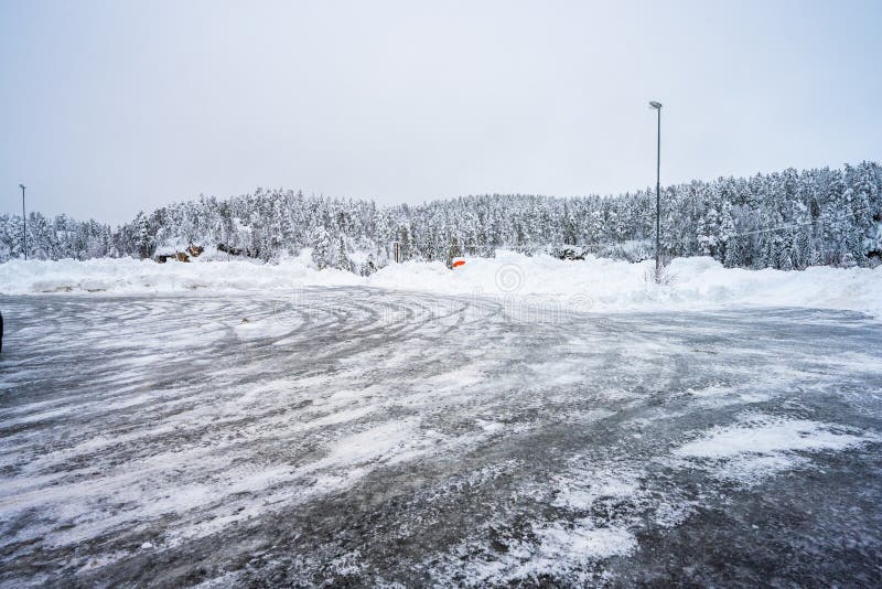 Icy Parking Lot and Deep Snow.. Stock Photo - Image of light, frost ...