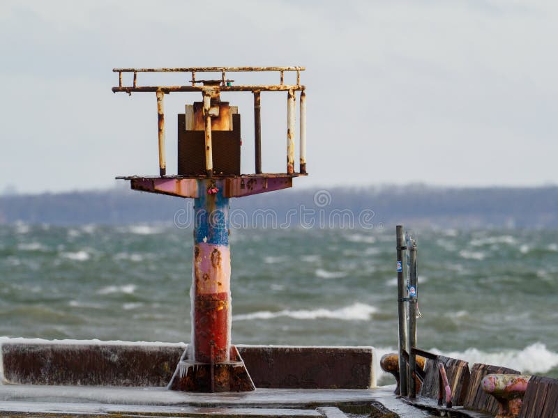 Icy Platform Stands at the End of a Breakwater in the Baltic Sea Stock ...