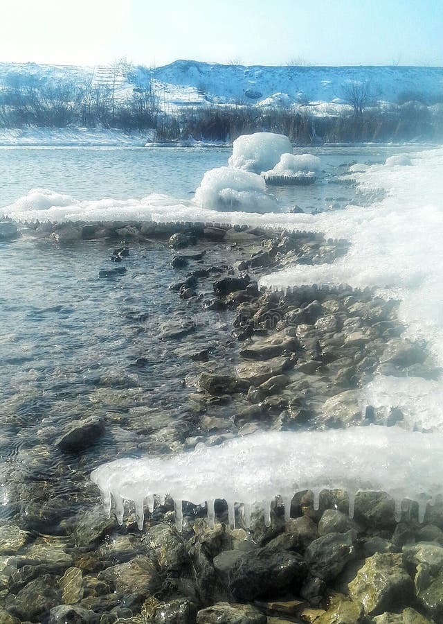 Icy river bank stock photo. Image of rocks, icicles - 111550930