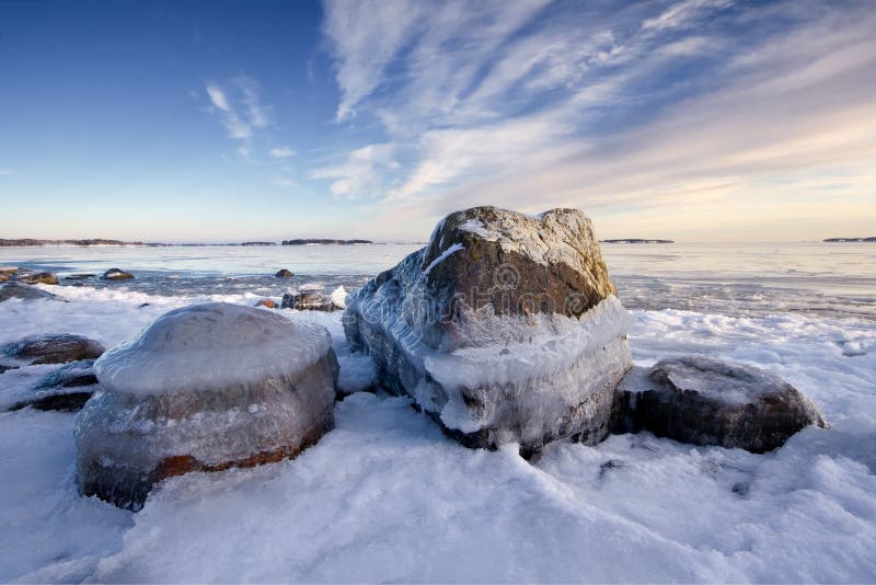 Icy sea and rocks stock image. Image of coast, dawn, stone - 22470477