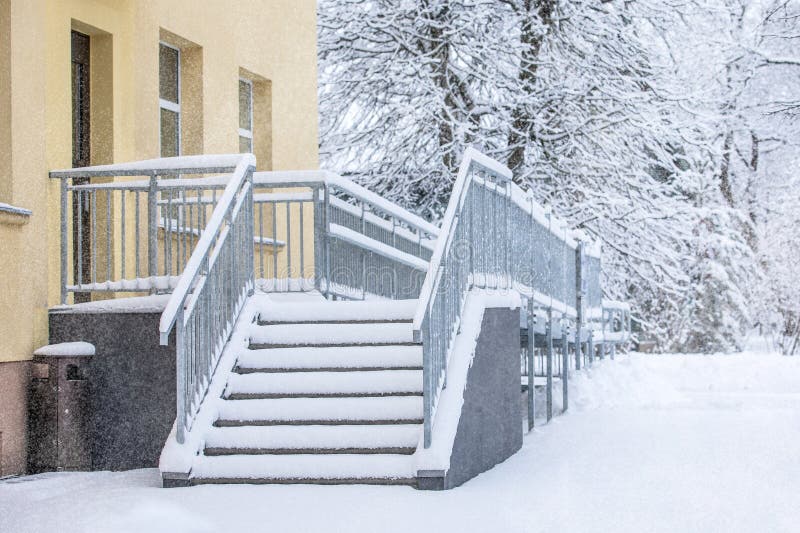 Icy and Snow-covered Entrance Stairs. Metal Structure Stock Photo ...