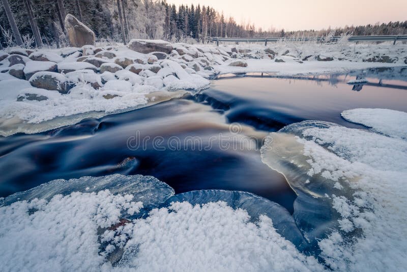 Icy Sunset on the River stock photo. Image of snow, snowy - 37196572