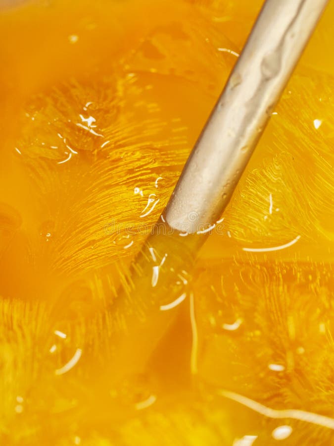Icy syrup stock photo. Image of macro, fruit, spoon, yellow - 14904056