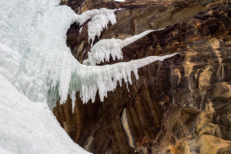 Icy Waterfall at Rock Cliff in Winter Time Stock Photo - Image of ...