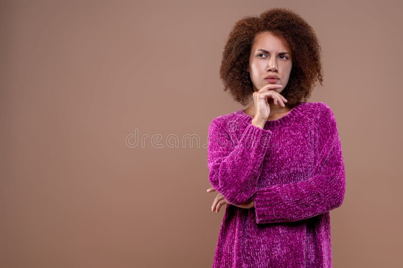 Dark-haired Young Woman Looking Thoughtful Stock Photo - Image of woman ...
