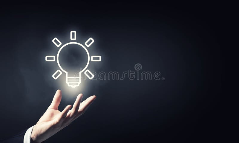 Idea in hand stock image. Image of hold, dark, bulb, glowing - 58594745