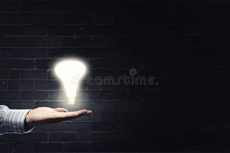 Idea in hand stock photo. Image of holding, electric - 58828772