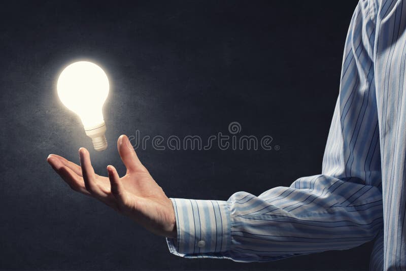 Idea in hand stock image. Image of economic, glowing - 59341117