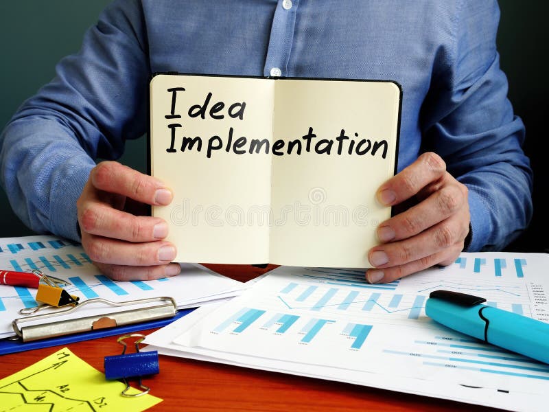Idea Implementation Plan in the Small Notepad Stock Photo - Image of ...