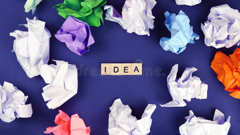 Idea Label and Crumpled Colored Papers on the Table Stock Photo - Image ...