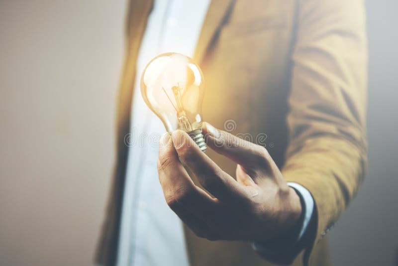 Idea or Light Bulb on Man Hand Stock Photo - Image of hand, imagination ...
