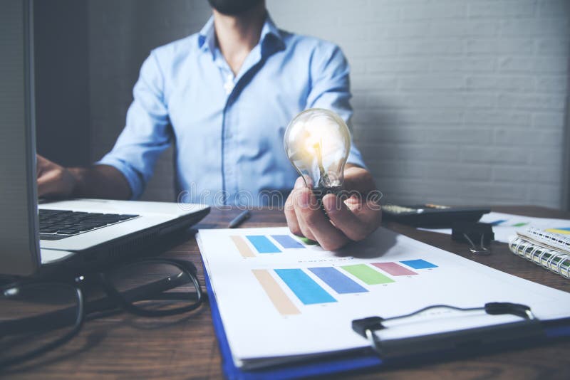 Idea or Light Bulb Man Hand Stock Photo - Image of document, keyboard ...