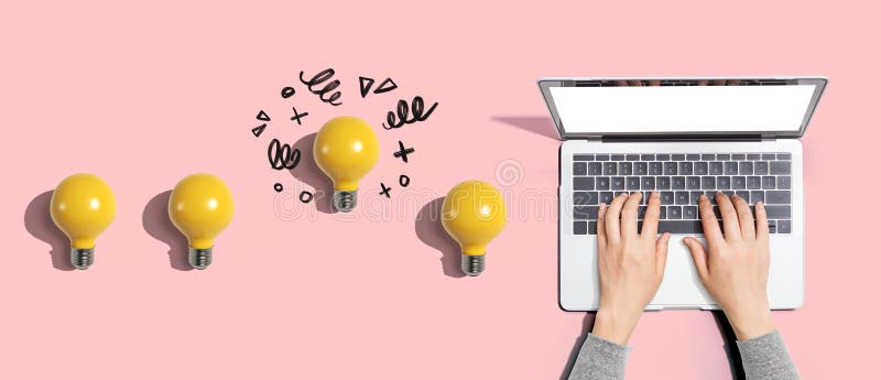 Idea Light Bulbs with Person Using a Laptop Computer Stock Image ...