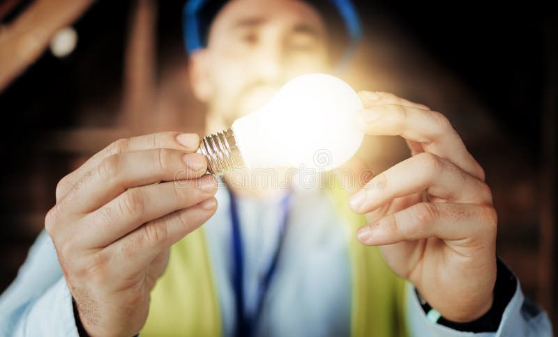 Idea, Light and Man Engineer Holding a Lightbulb for Vision, Innovation ...