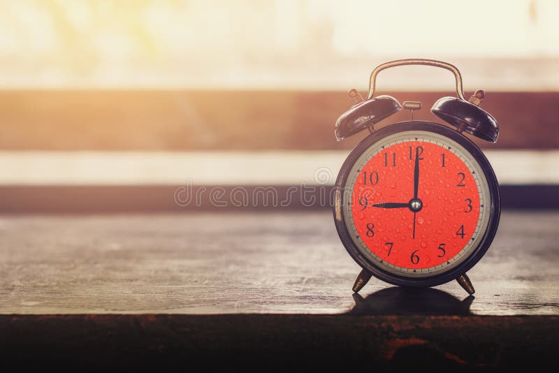 Idea 9 O`clock with Drops of Water with Golden Dawn Light Stock Image ...