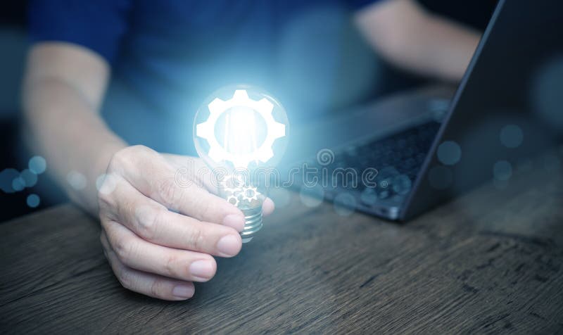 Idea and Solution for Business and Technology Concept. a Man Holds a ...