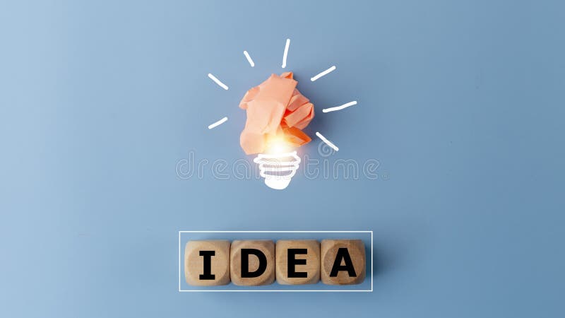 Idea Word and Light Bulb on Blue Background with Copy Space. Creative ...