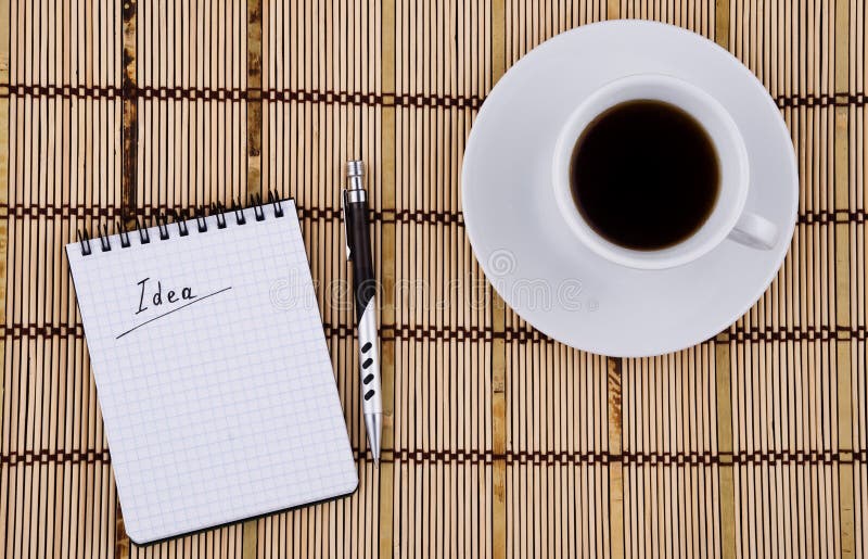Idea Written in Notepad, Pen and Coffee Cup Stock Photo - Image of text ...