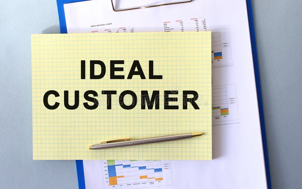 IDEAL CUSTOMER Text Written on Notepad with Pencil. Notepad on a Folder ...