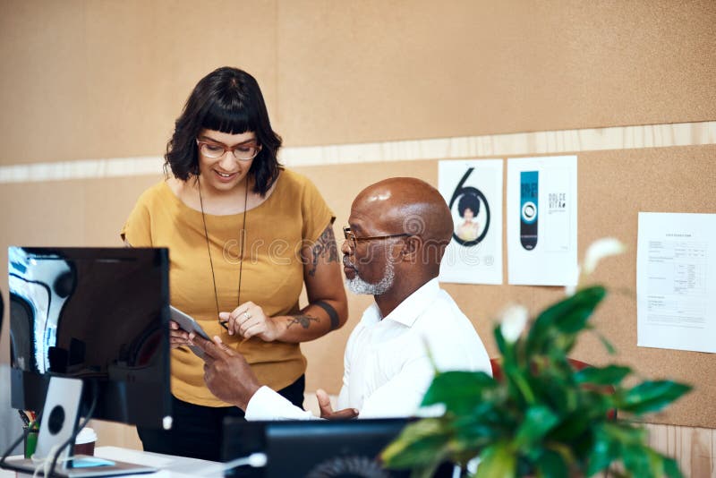 Ideas always Come Easier when we Work Together. Two Businesspeople ...