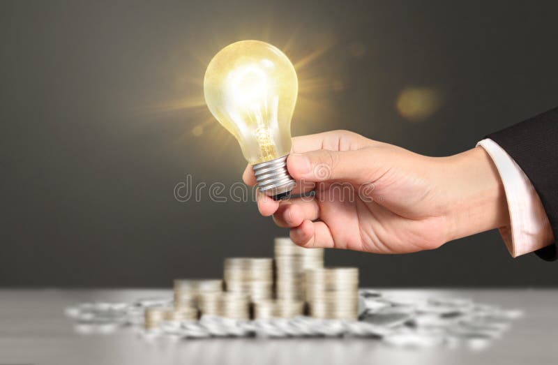 Ideas, Energy Saving Light Bulb Stock Photo - Image of bright, holding ...
