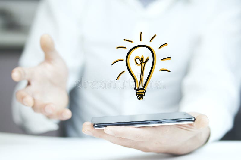 Ideas Light Bulb with Phone in a Hand Stock Photo - Image of object ...
